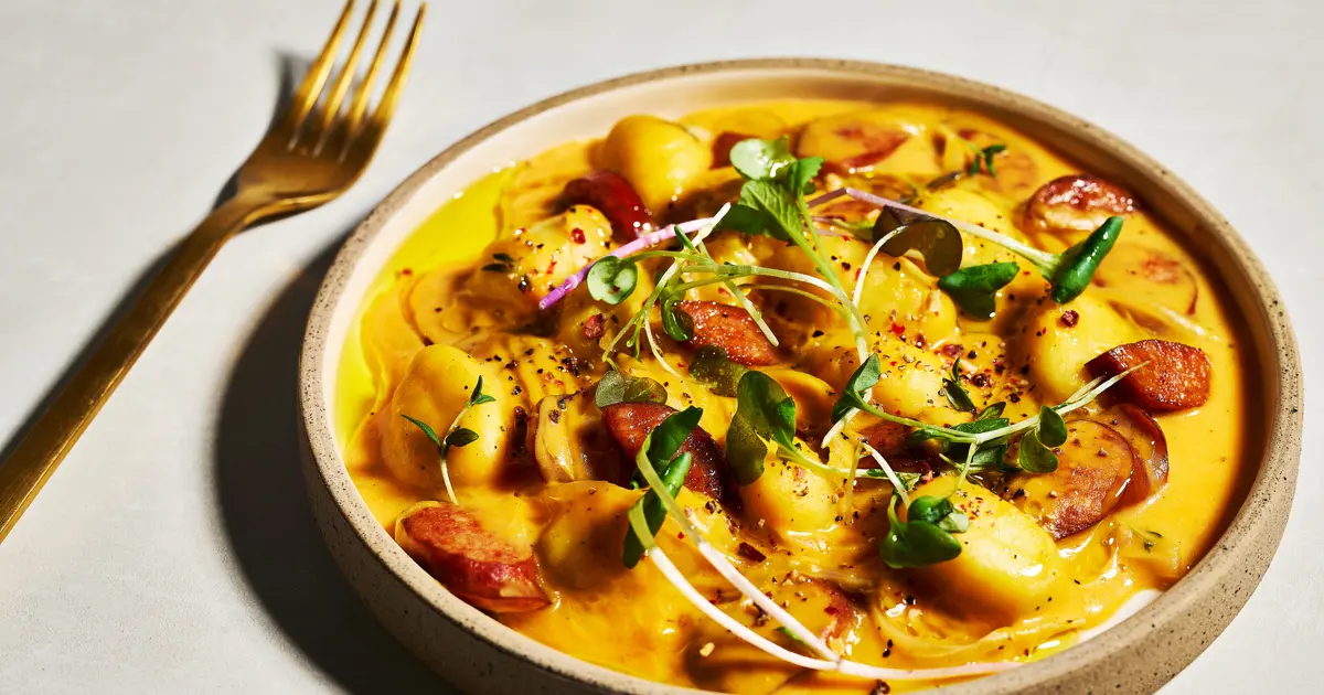 Tasty pumpkin gnocchi stew with Angela sausage